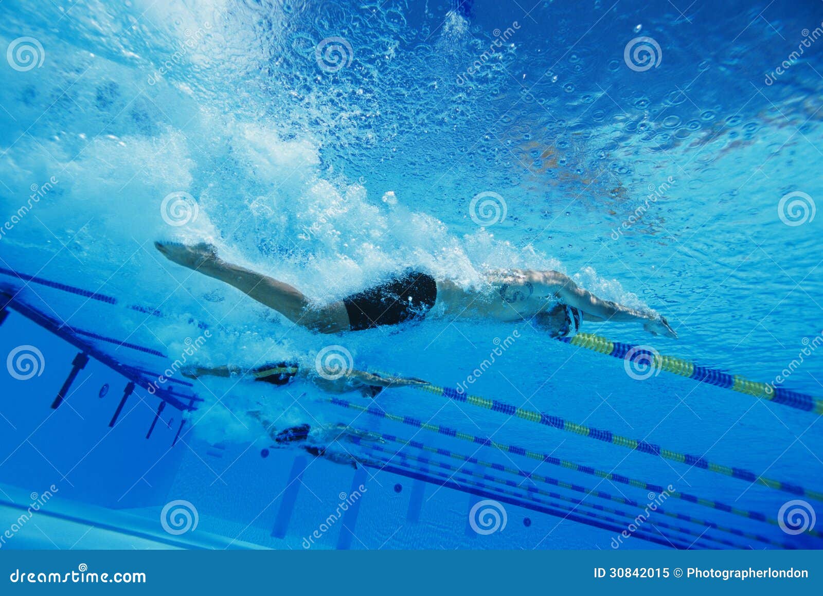 Men Swimming Underwater stock image. Image of angle, male - 30842015