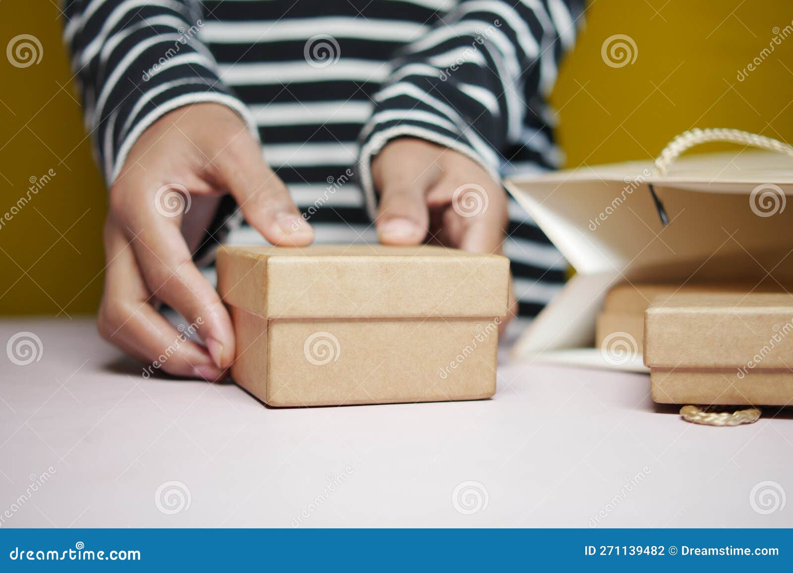 Men Taking Out a Gift Box from a Bag Stock Photo - Image of shopping ...