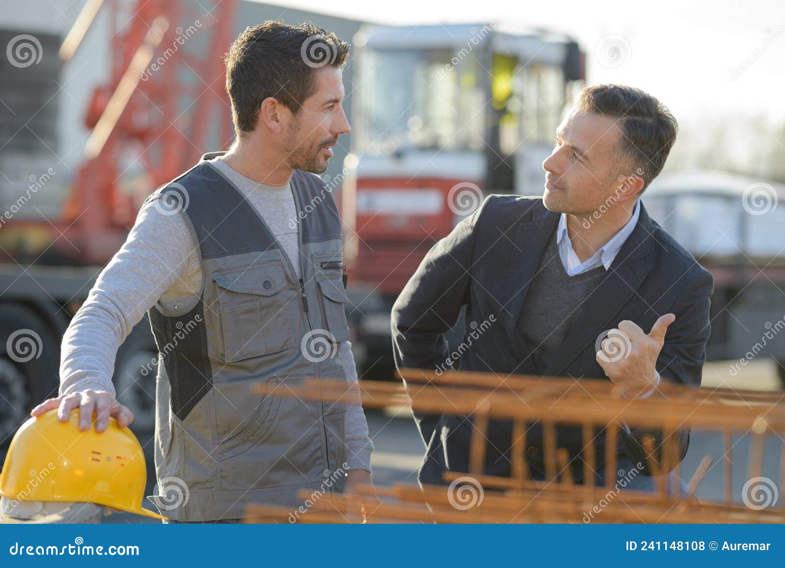 Men Talking on Construction Site Stock Photo - Image of factory, detail ...