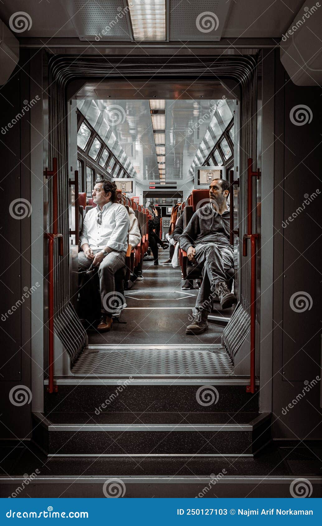 Men in the train editorial stock photo. Image of selective - 250127103