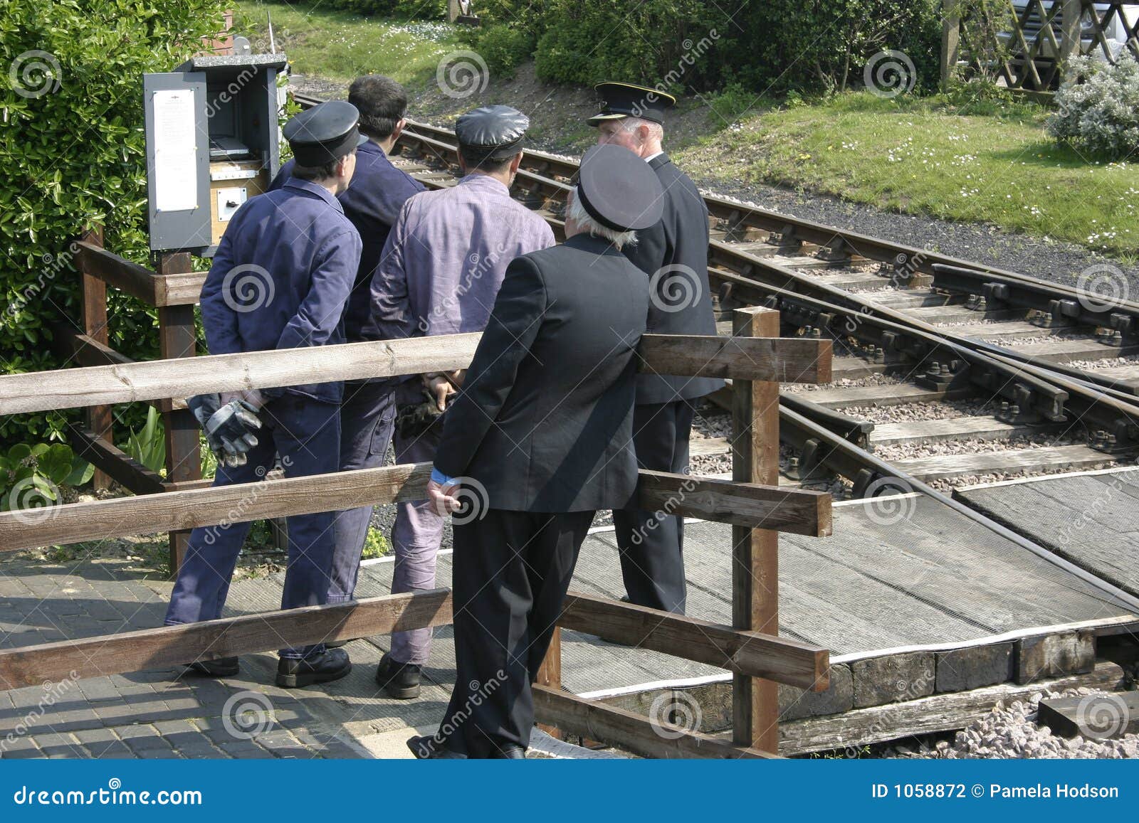 Men train watching stock photo. Image of showing, railway - 1058872