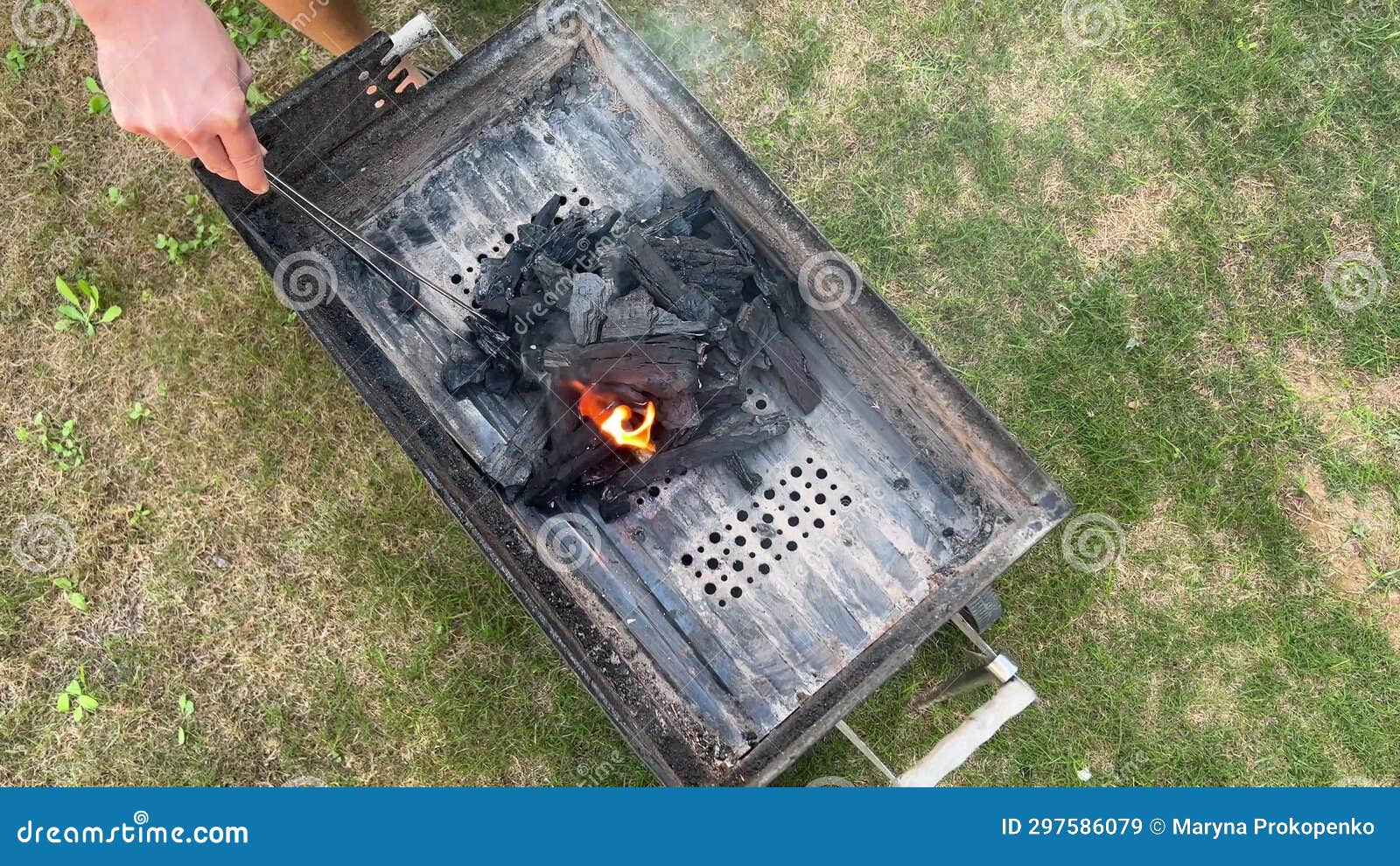 Men Turning Over Burning Coals in the Grill Stock Video - Video of ...