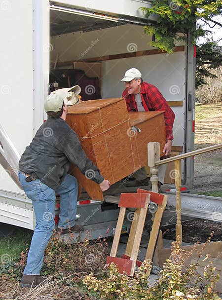 Men unload a moving van stock photo. Image of deliver - 1786714