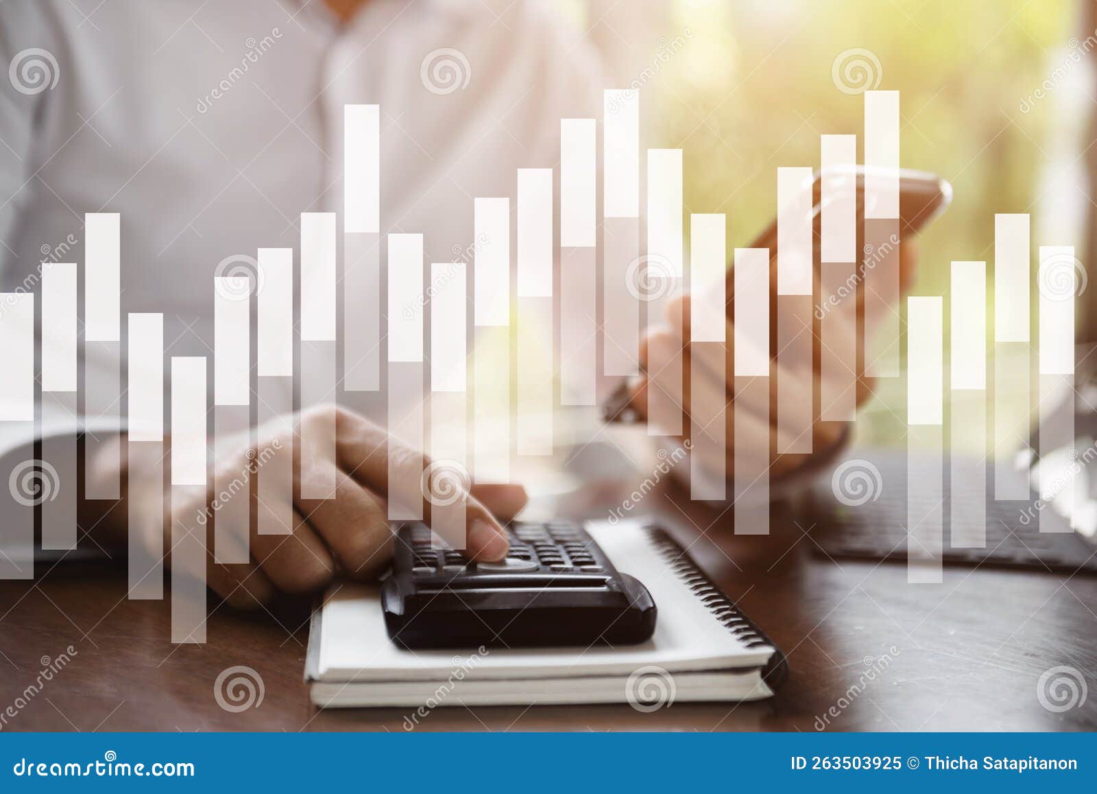 Men Use the Calculator and Take Notes with Calculations about the ...