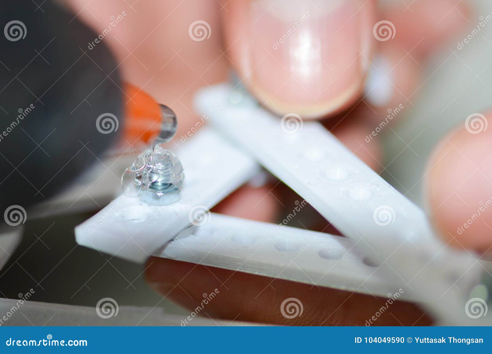 Men are Using Hot Glue To the Device. Stock Photo - Image of person ...
