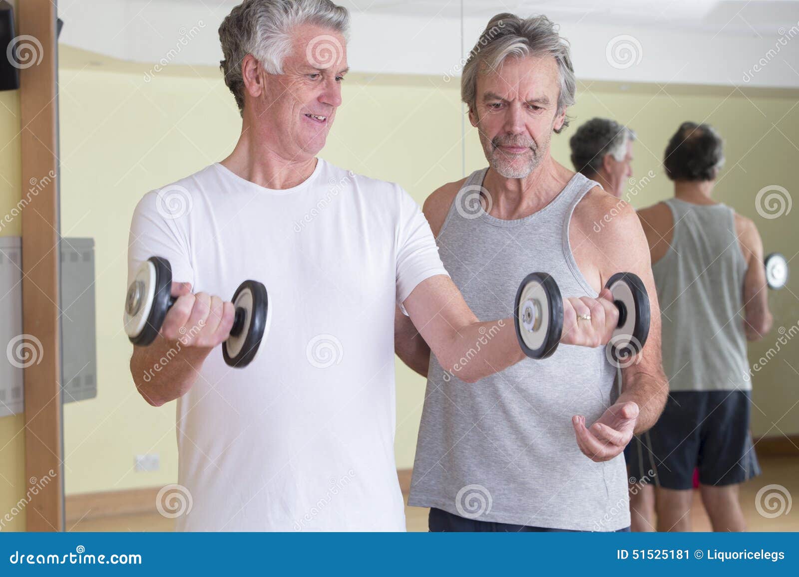 Men using weights together stock image. Image of caucasian - 51525181