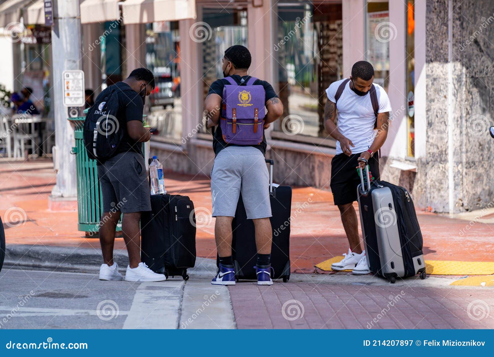 Men Waiting for Lyft or Uber Ride in Miami Beach during Spring Break ...
