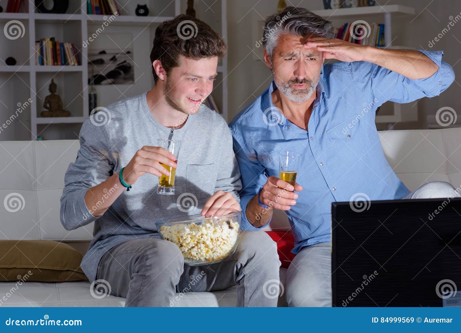 Men watching on television stock image. Image of boys - 84999569