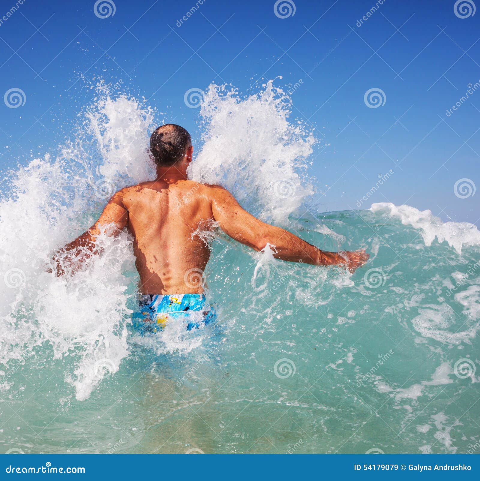 Men in wave stock image. Image of tourism, tropical, coast - 54179079