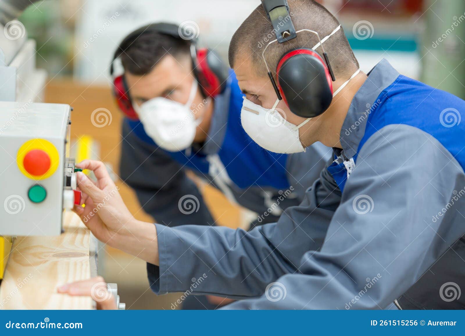 Men Wearing Masks Setting Up Woodworking Machine Stock Photo - Image of ...