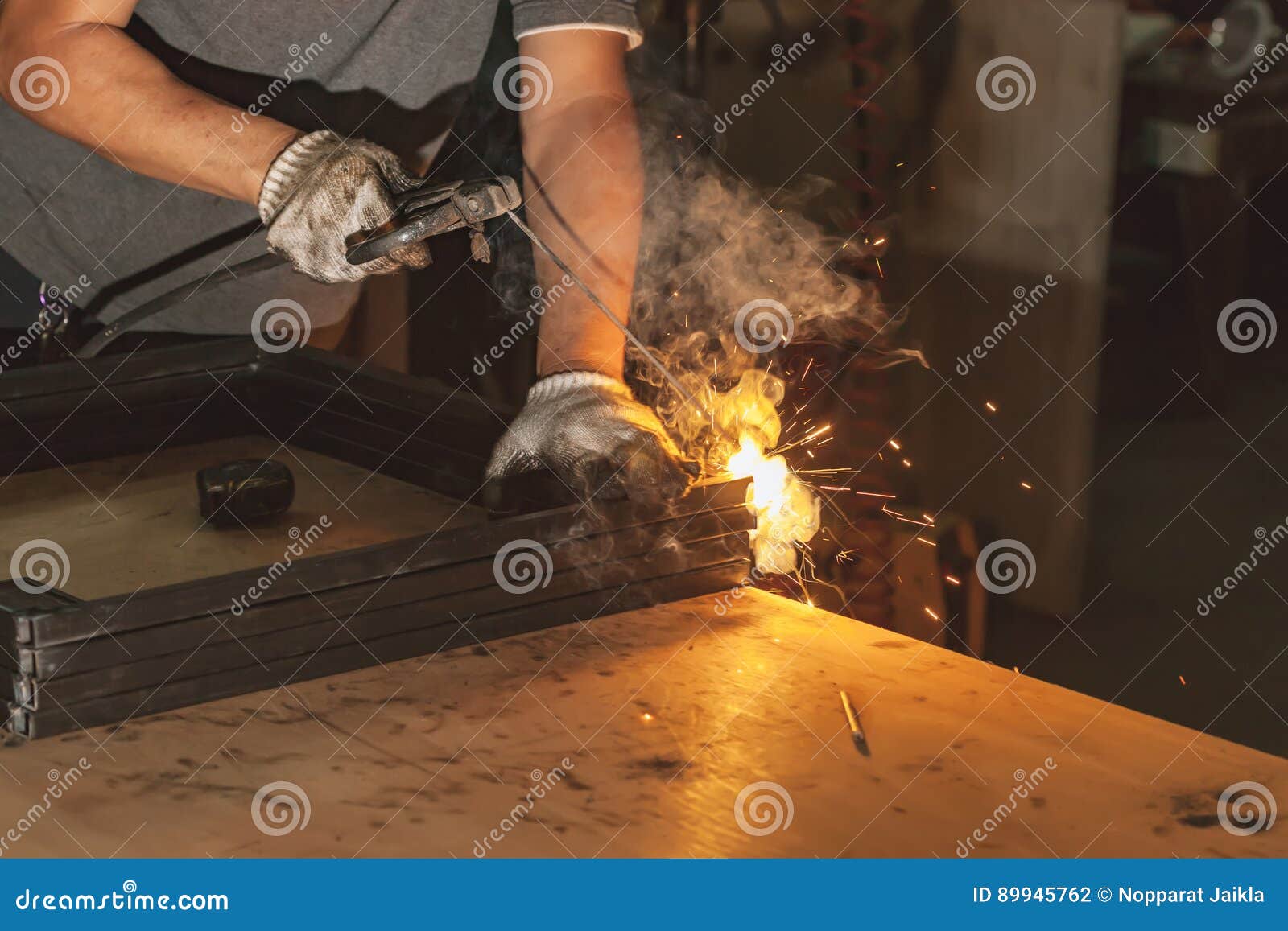 Men welder on a workshop stock photo. Image of equipment - 89945762