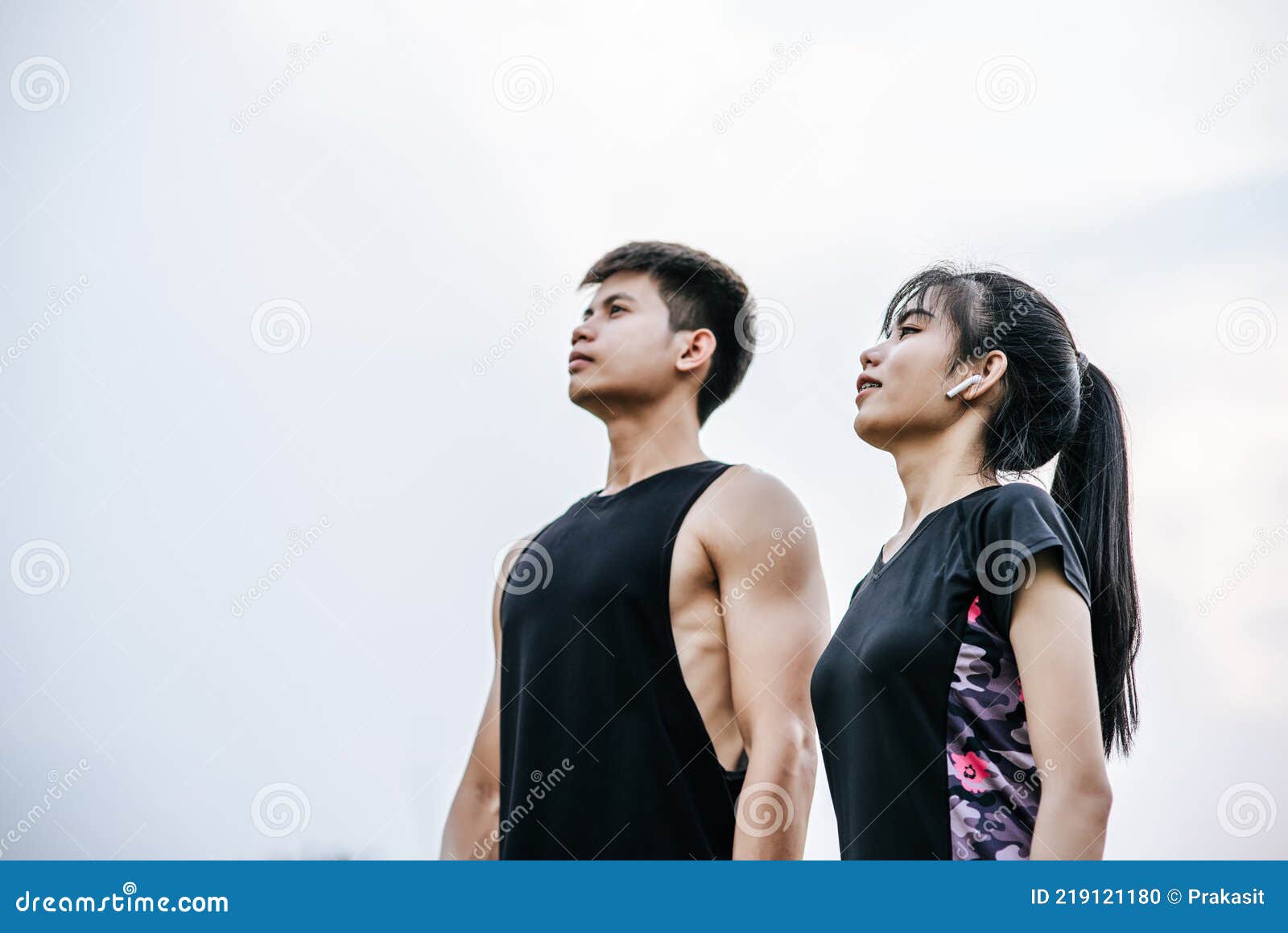 Men and Women Stand and Look at the Sky after Exercise Stock Photo ...