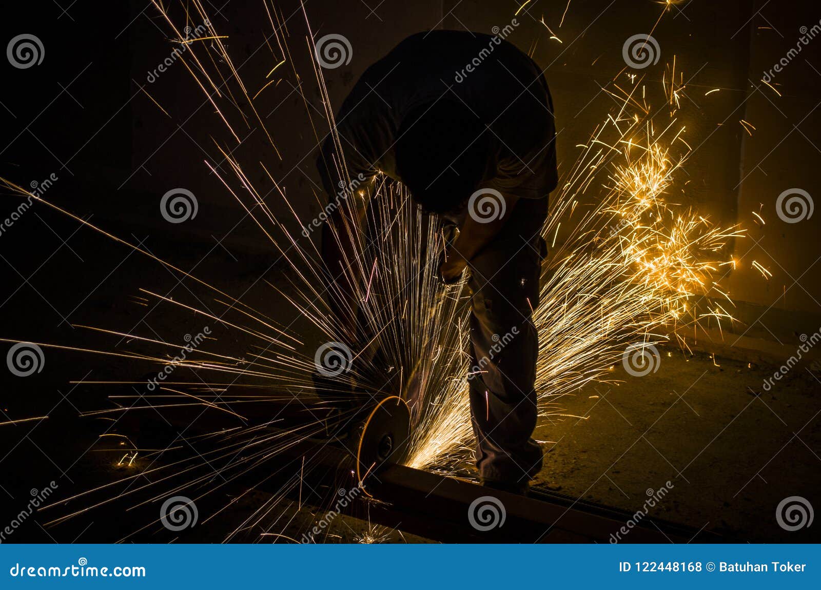 Men at work grinding steel stock photo. Image of close - 122448168
