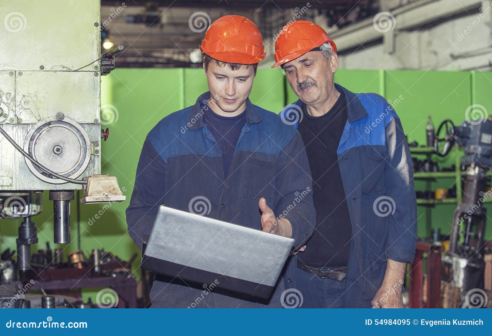Men Work on the Old Factory for the Installation of Equipment Stock ...