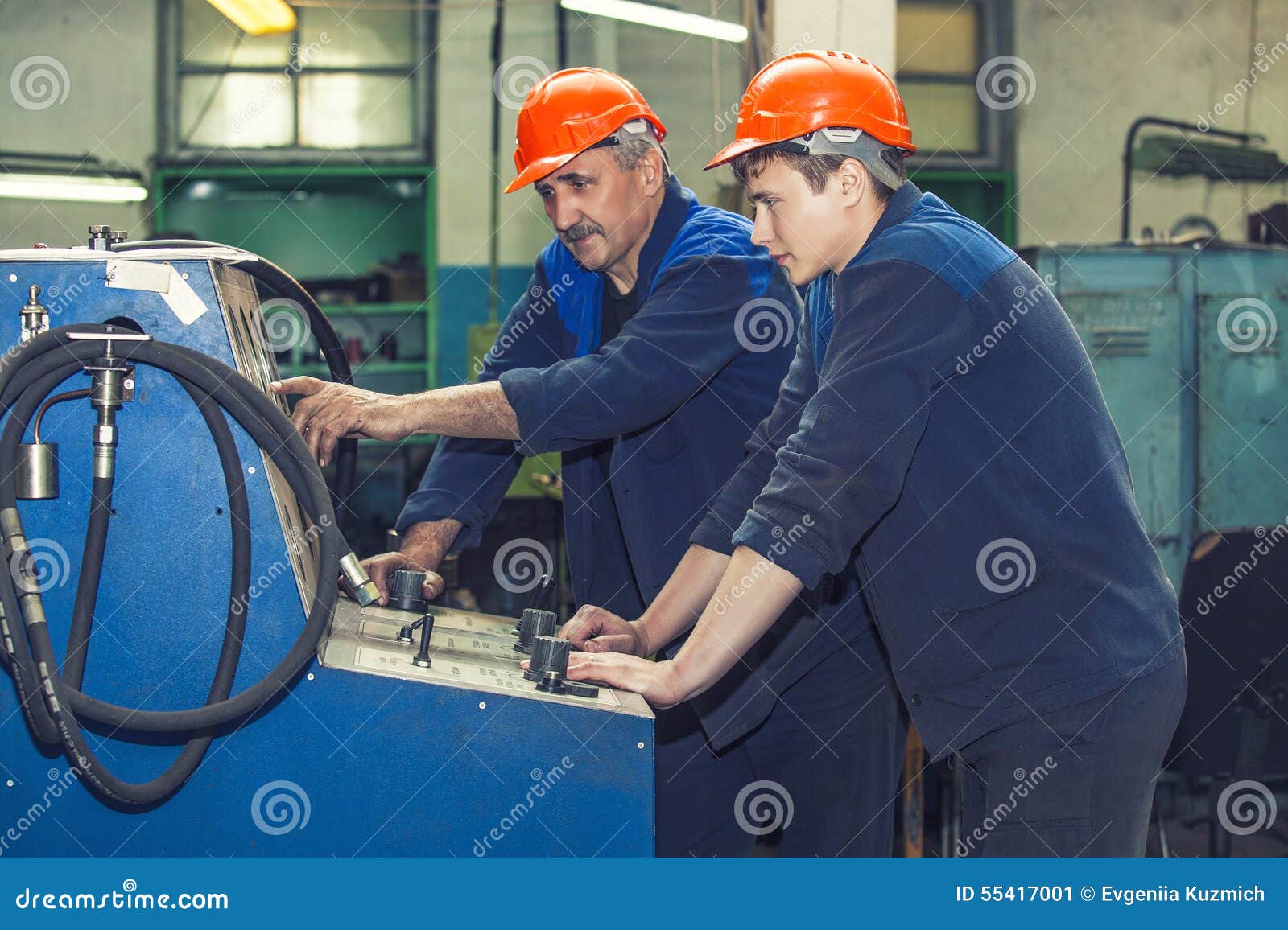 Men Work on the Old Factory for the Installation of Equipment Stock ...