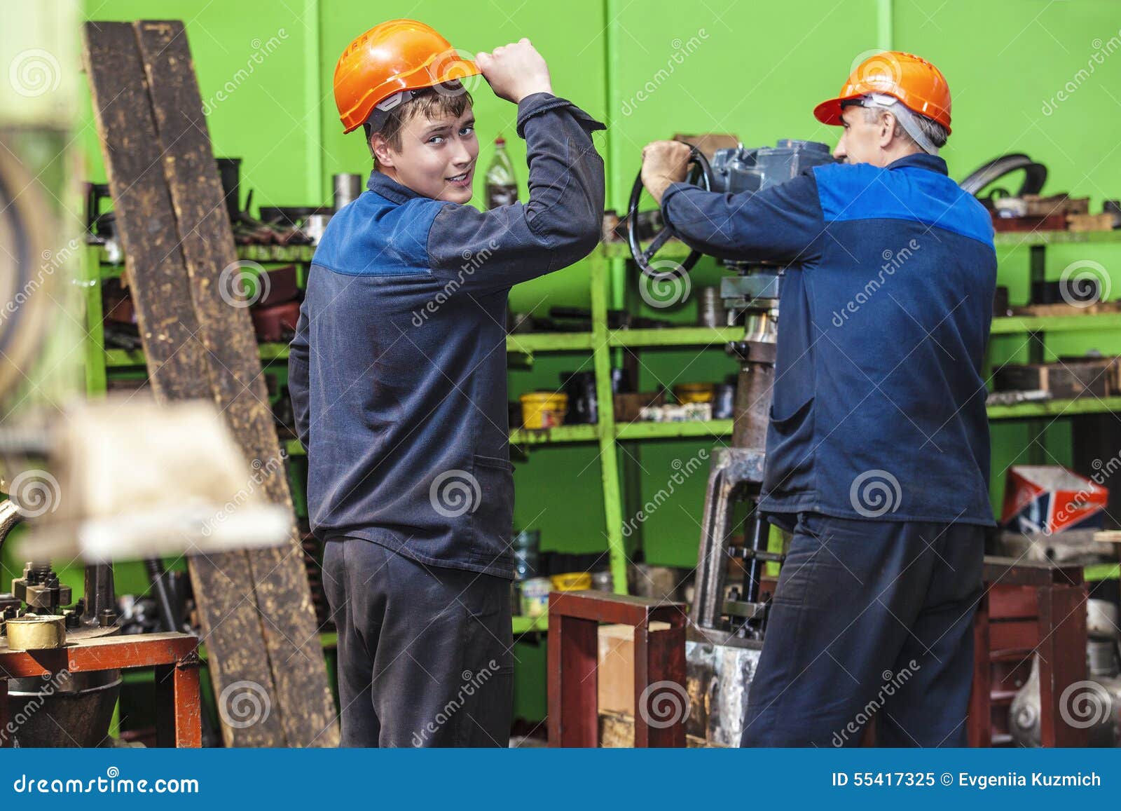 Men Work on the Old Factory for the Installation of Equipment Stock ...