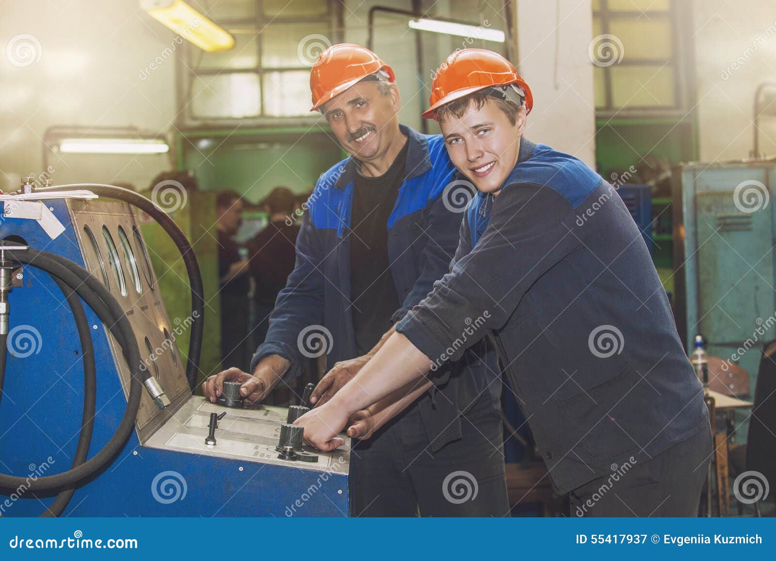 Men Work on the Old Factory for the Installation of Equipment Stock ...