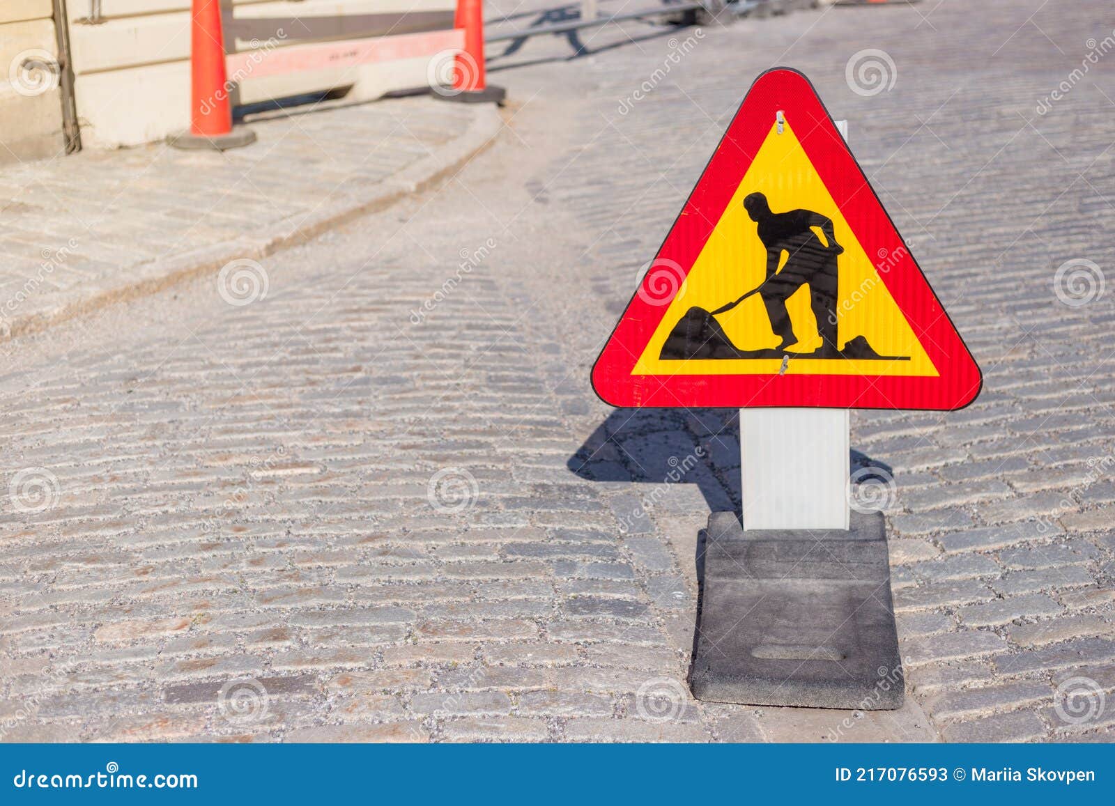 Men at Work Sign Board on the Street. Construction Site, Sign As ...