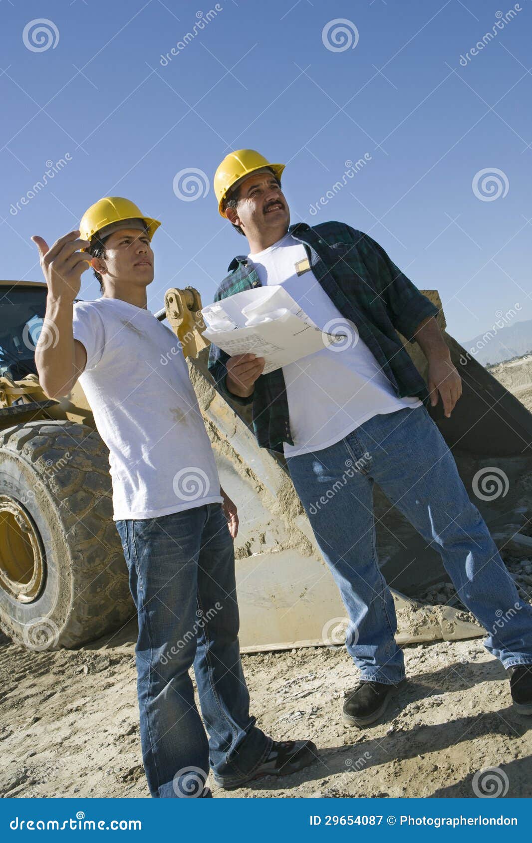 Men Working at Construction Site Stock Image - Image of middle, people ...