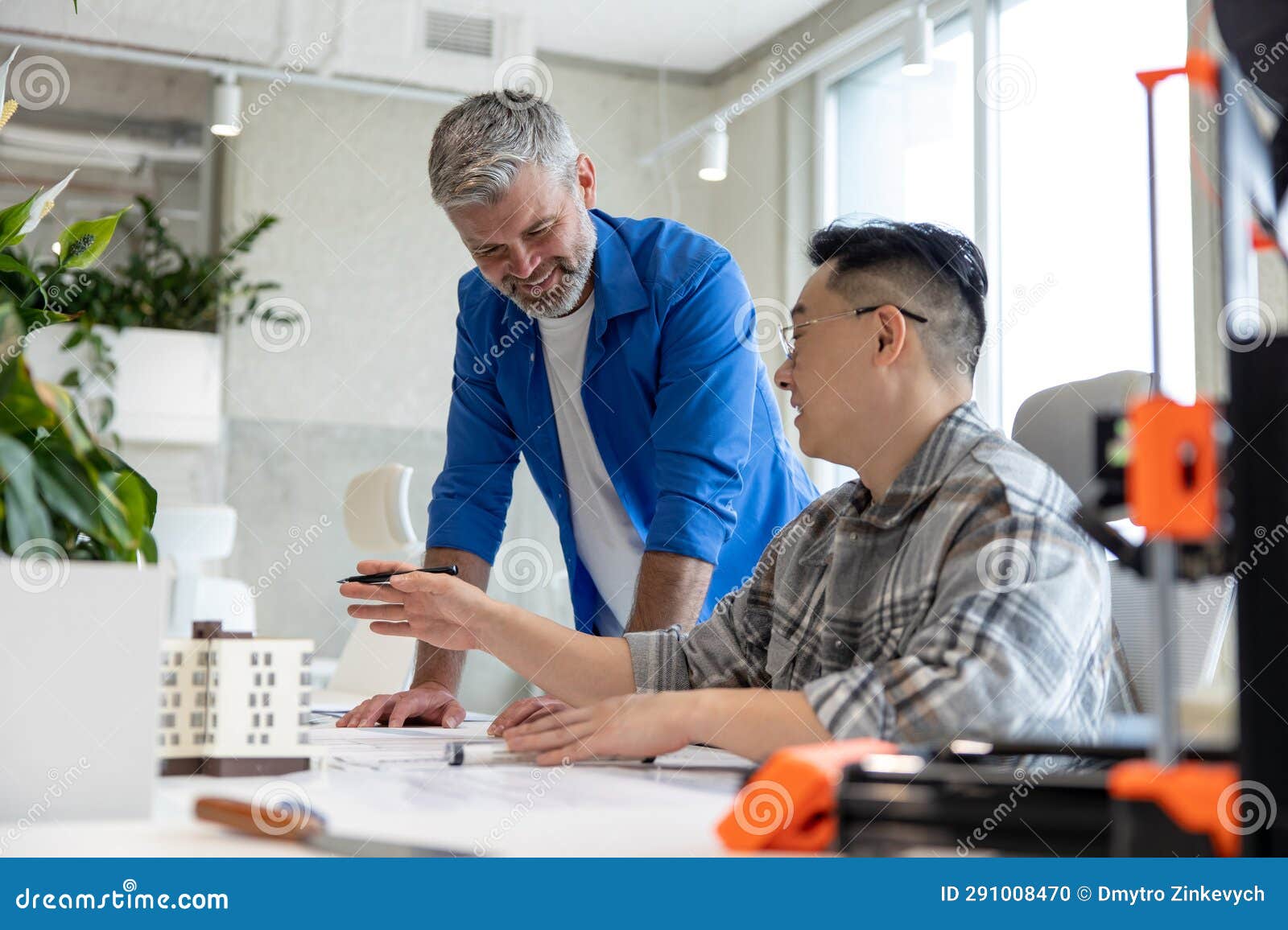 Men Working with 3D Printer and Blueprint for Designing Mechanical ...