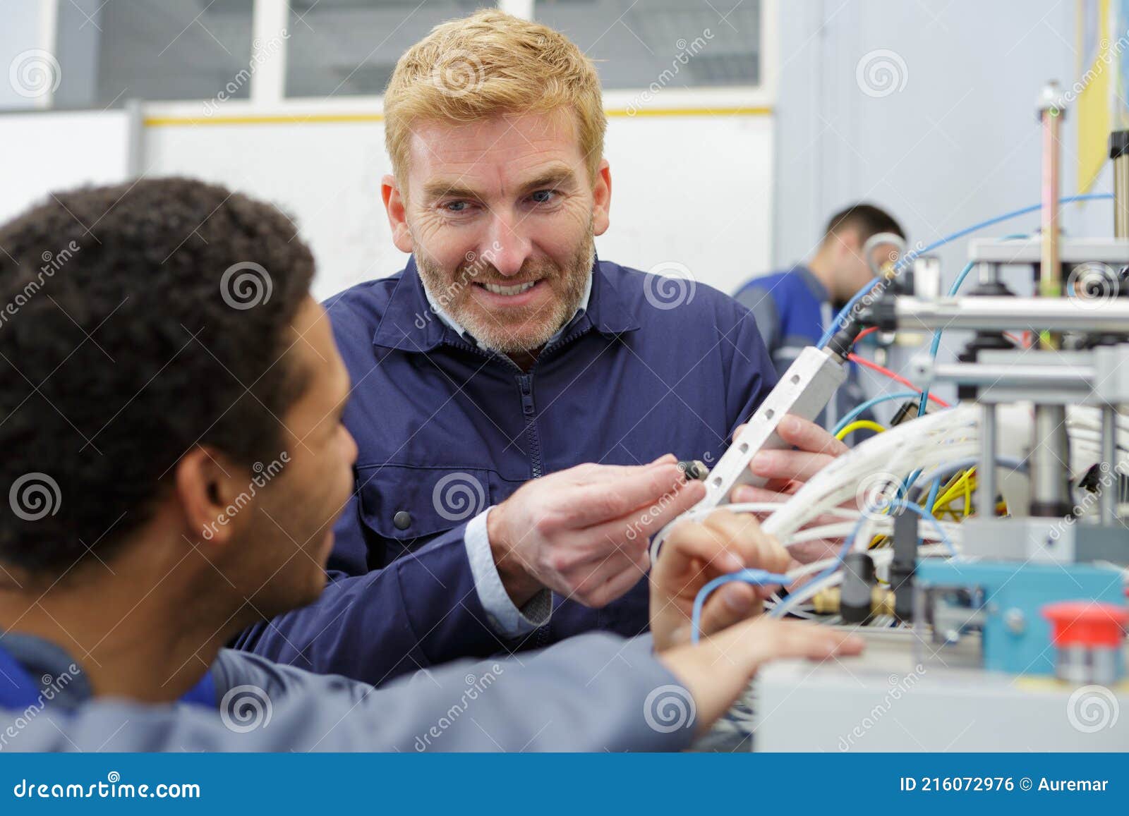 Men Working in Electronics Factory Stock Photo - Image of assemblyline ...