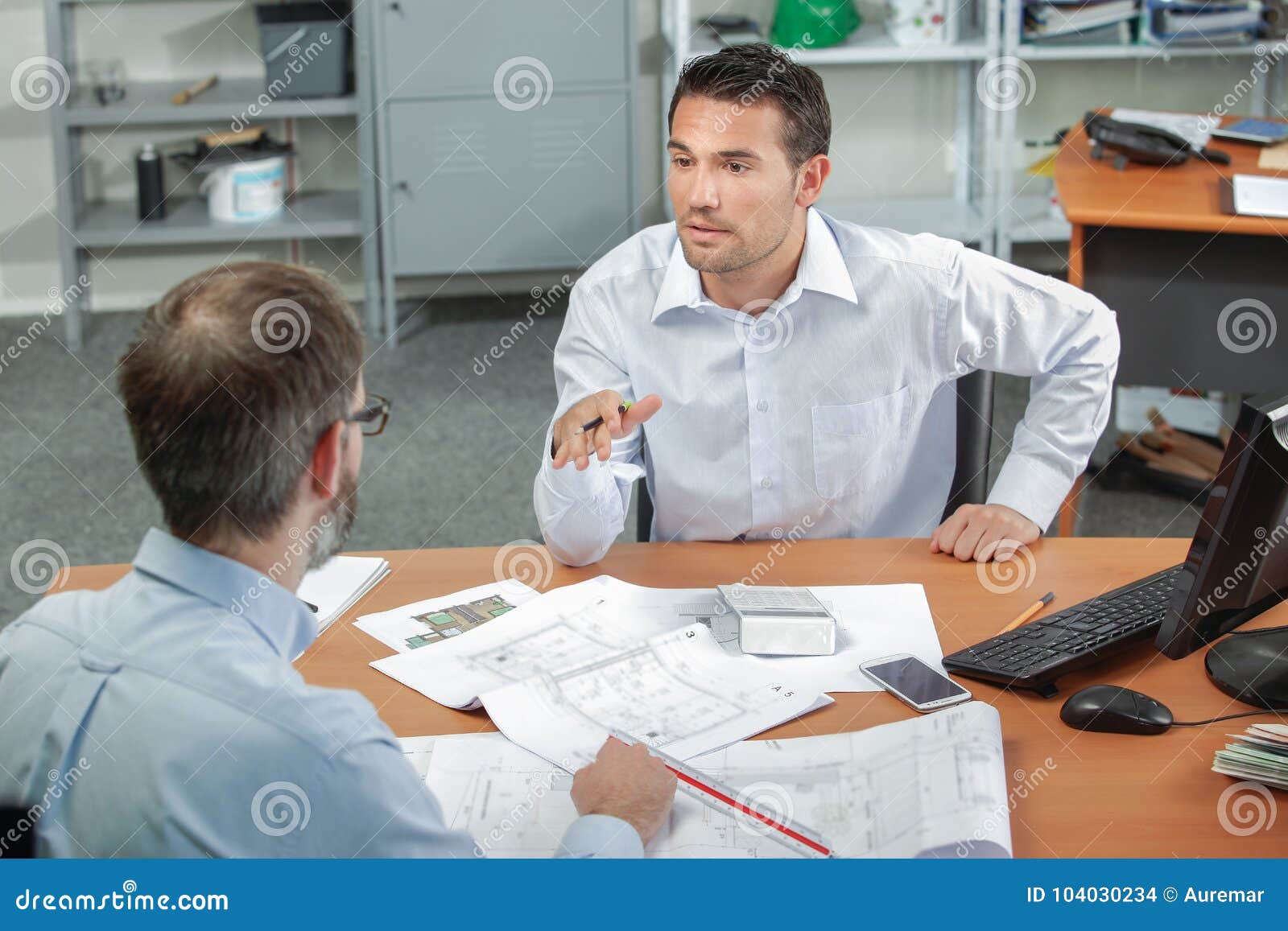 Men working inside office stock photo. Image of cabinets - 104030234