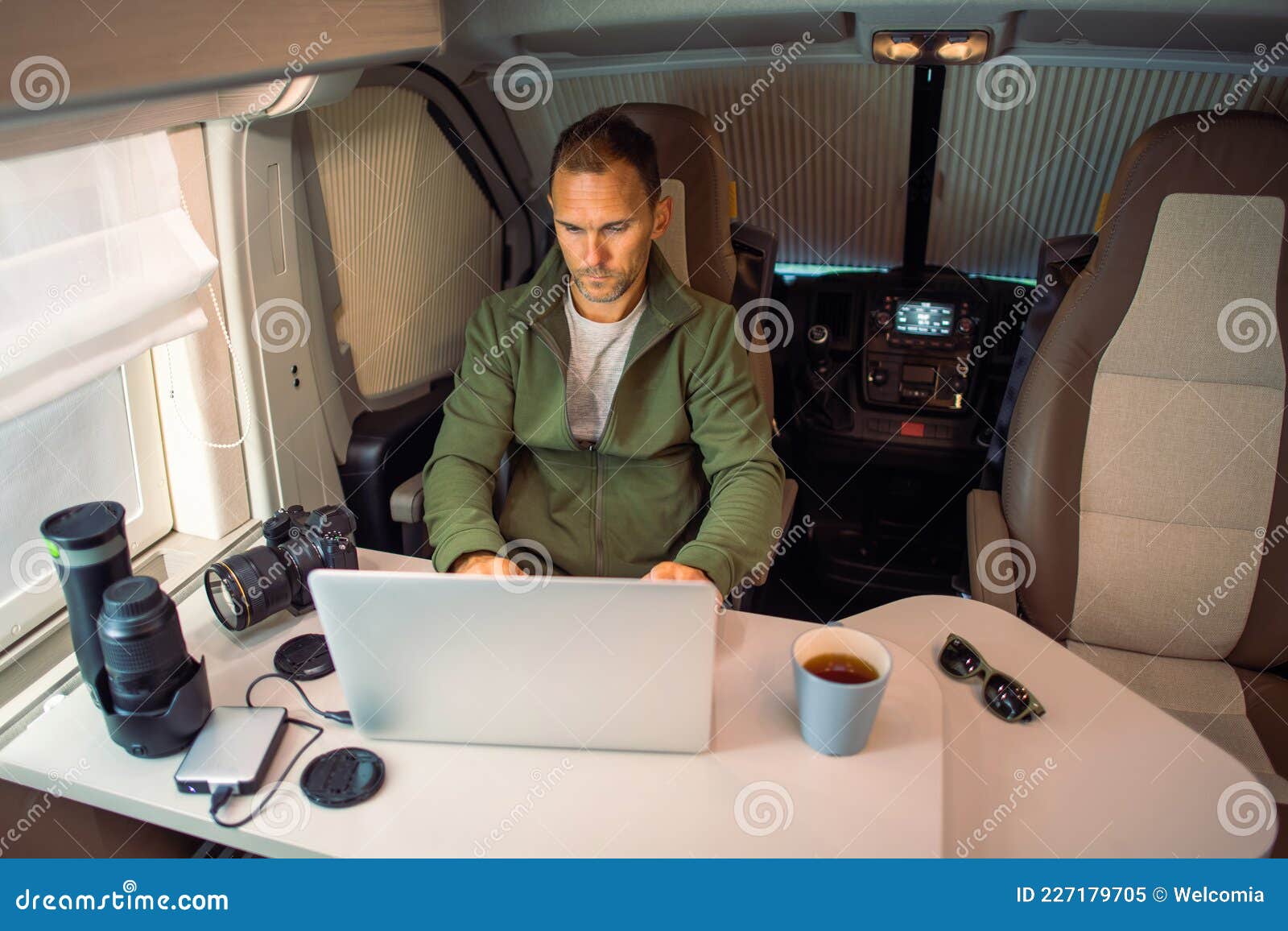 Men Working Remotely from Camper Van Using Internet Connection Stock ...