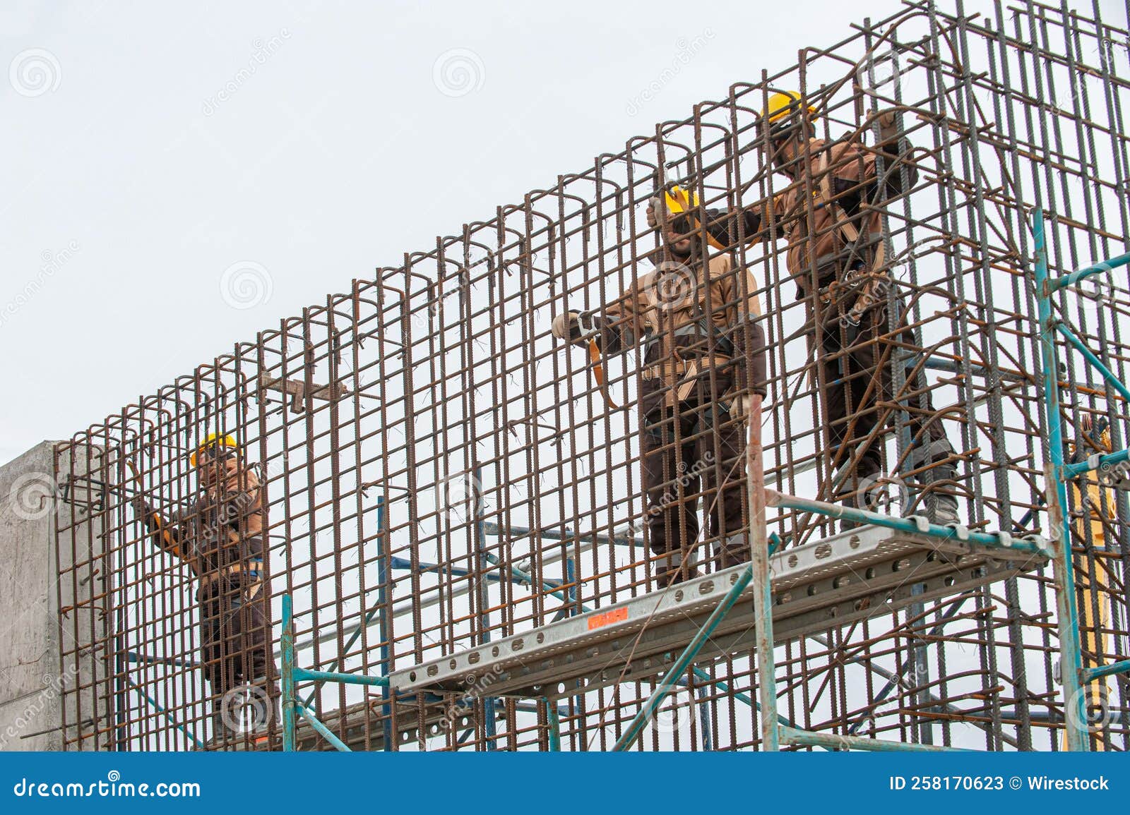 Men working on scaffolding stock image. Image of engineering - 258170623