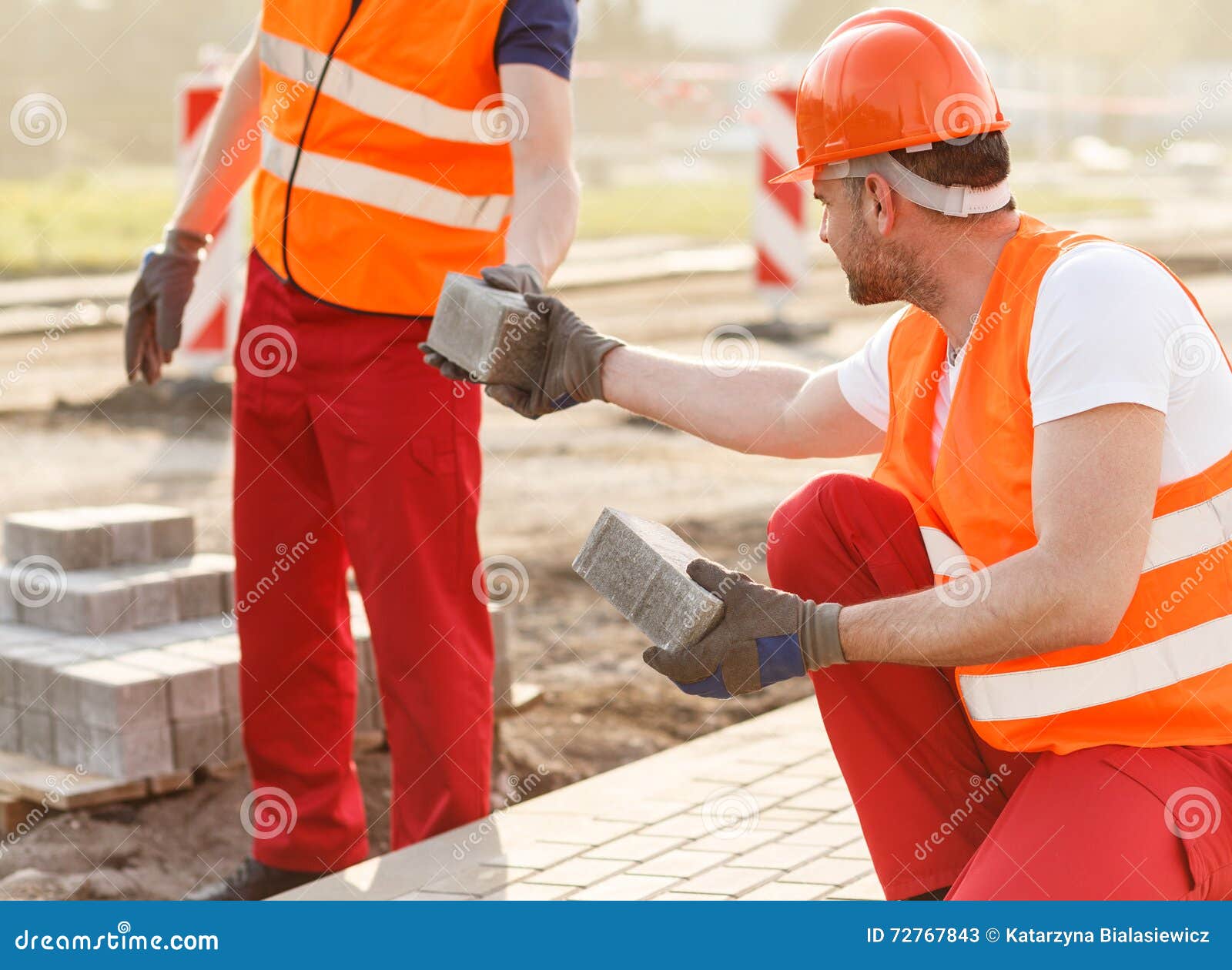 Men working in a team stock image. Image of brick, male - 72767843