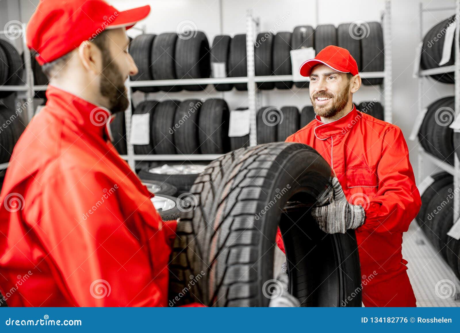 Men Working in the Warehouse with Tires Stock Photo - Image of storage ...