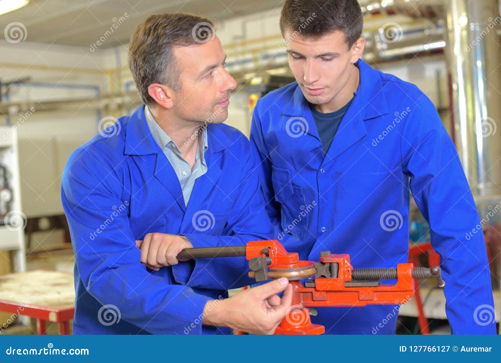 Men in the workshop stock image. Image of stationary - 127766127