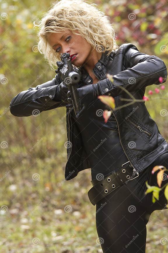 Menacing with machine gun stock image. Image of shooter - 27333811