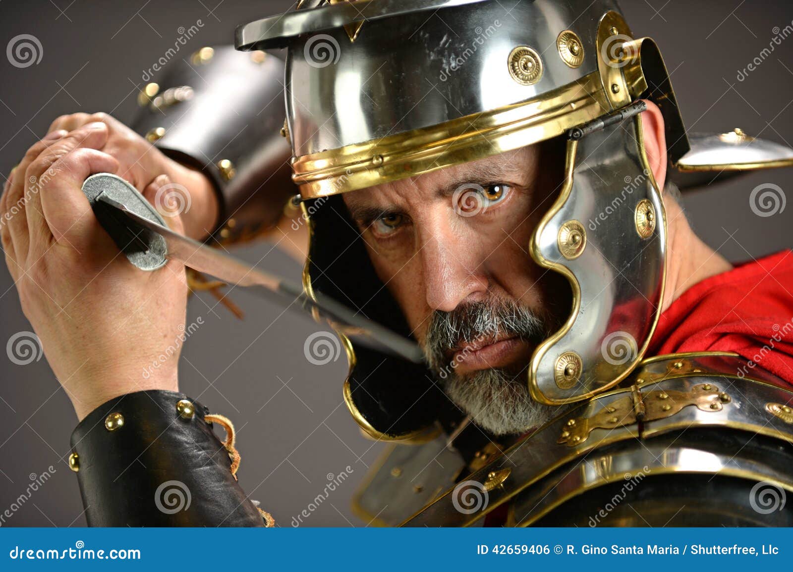 Menacing Roman Soldier stock photo. Image of sword, metal - 42659406