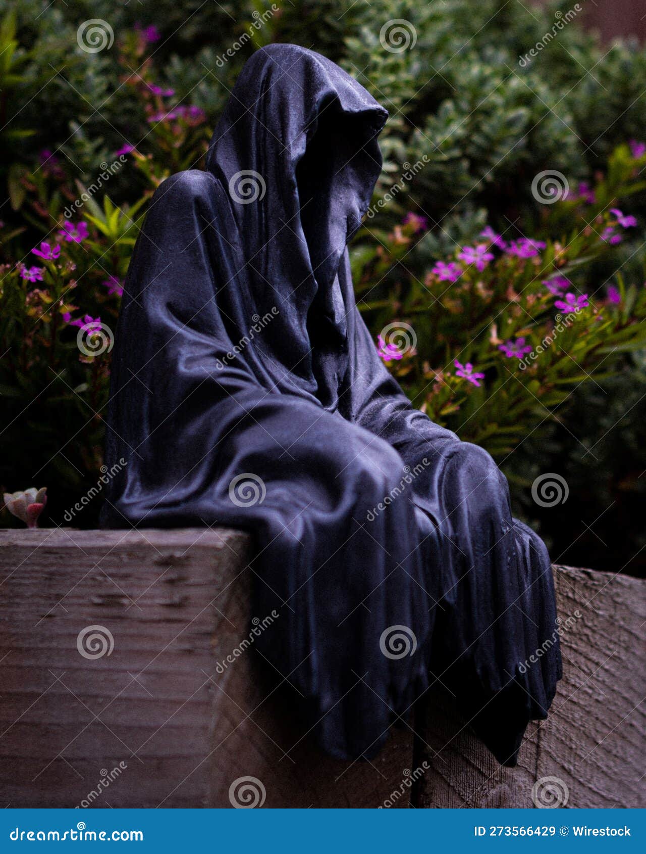Menacing Statue of the Grim Reaper, Cloaked in a Long, Flowing Robe ...