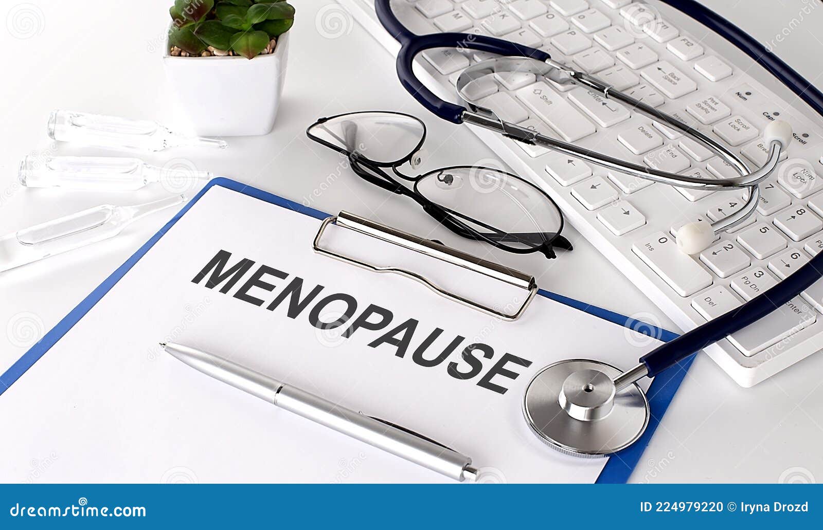 MENOPAUSE Text on White Paper on White Background. Stethoscope ,glasses ...