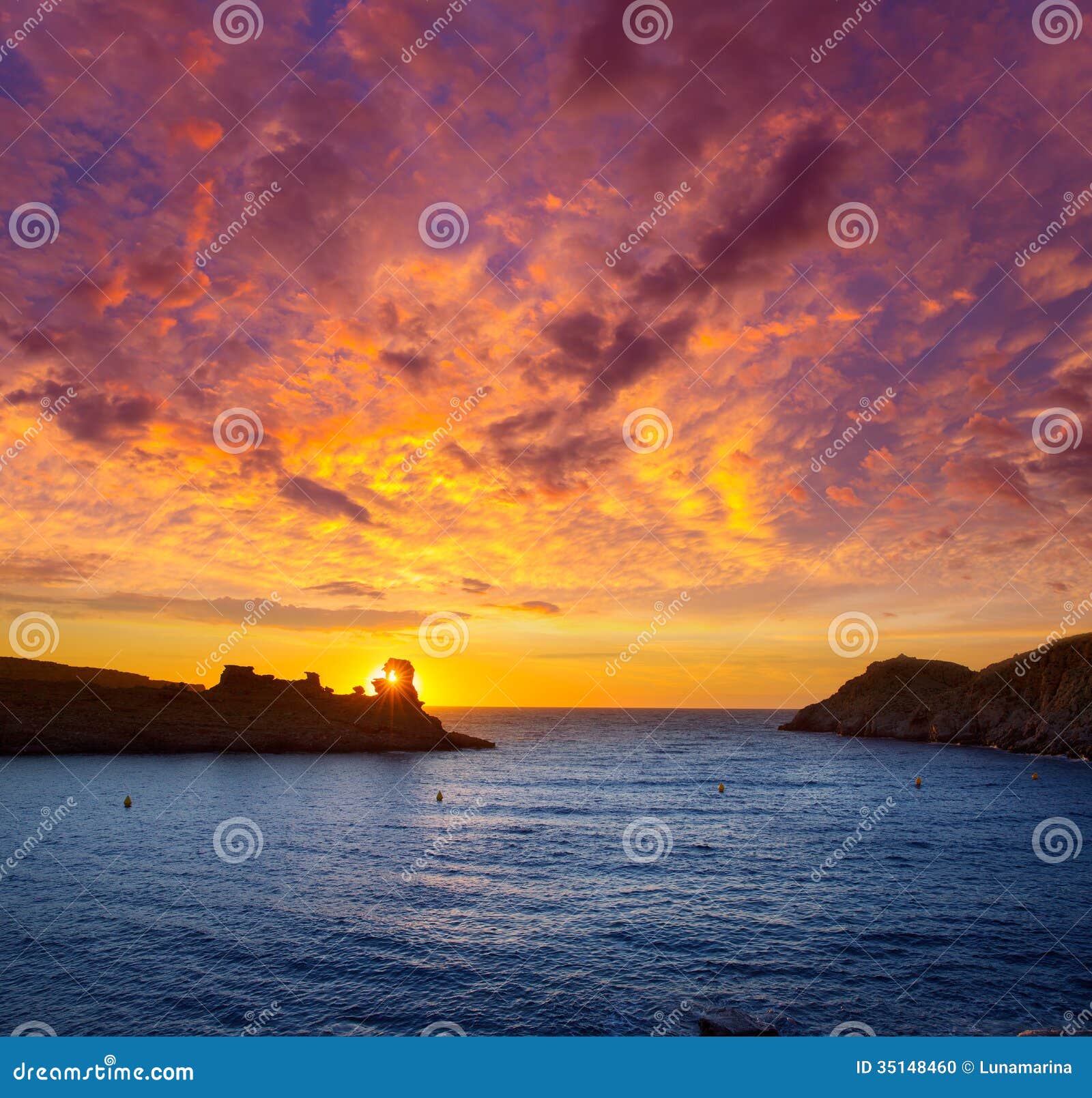 Menorca Sunset in Cala Morell at Ses Torretes Beach Stock Photo - Image ...