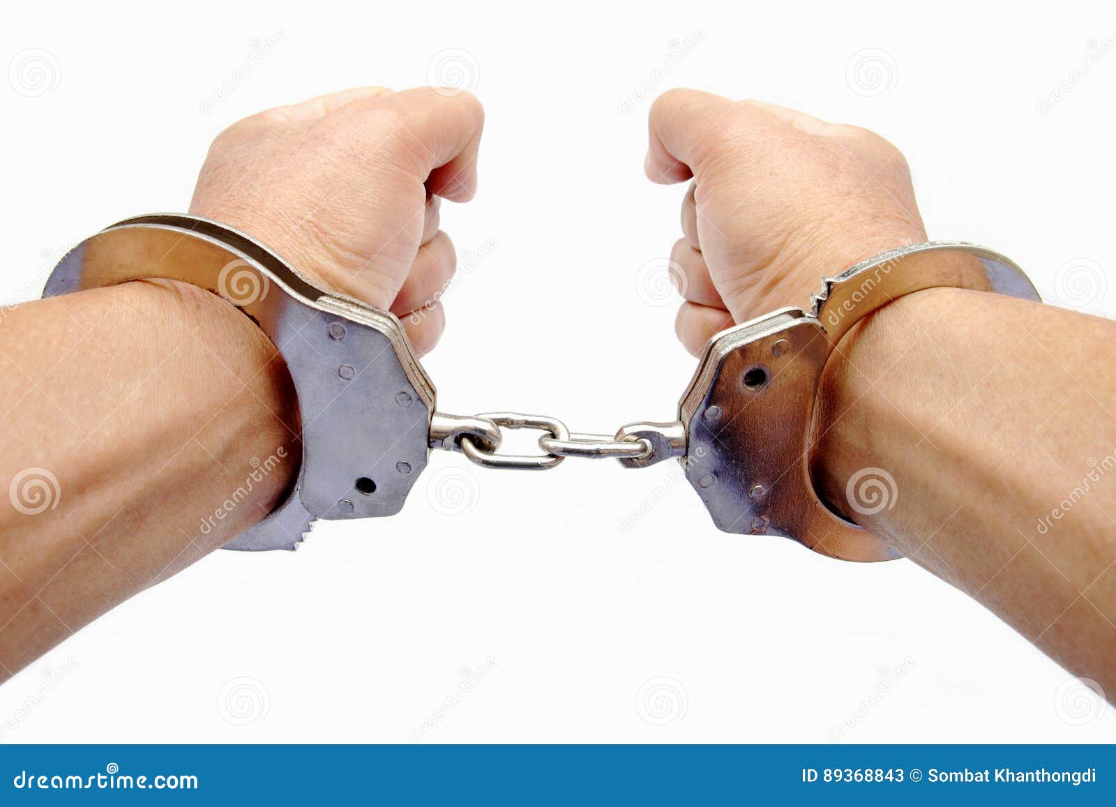 Menotte dans une main image stock. Image du concepts - 89368843