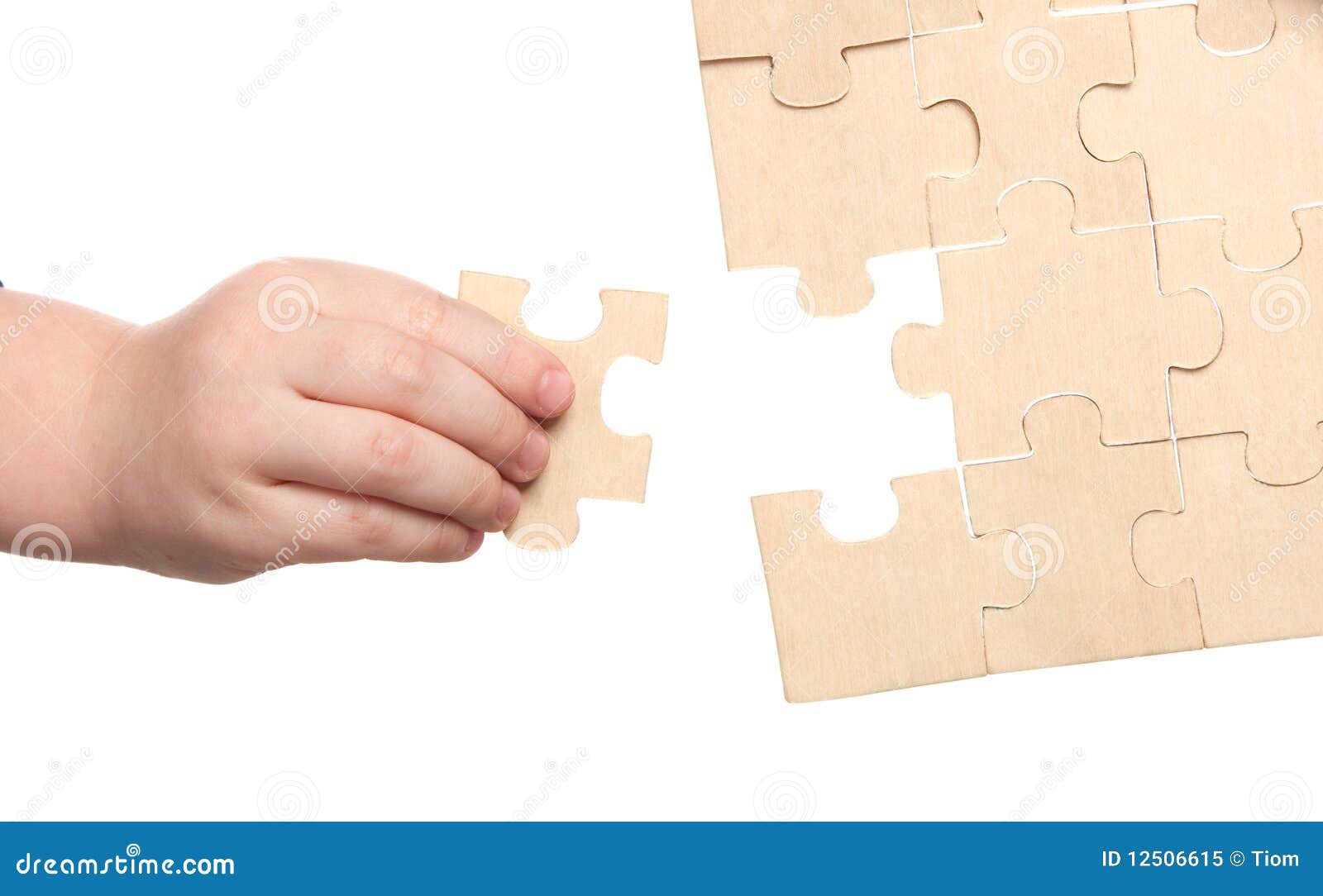 Mens and Childs Hands Finishing Puzzles Stock Image - Image of puzzle ...