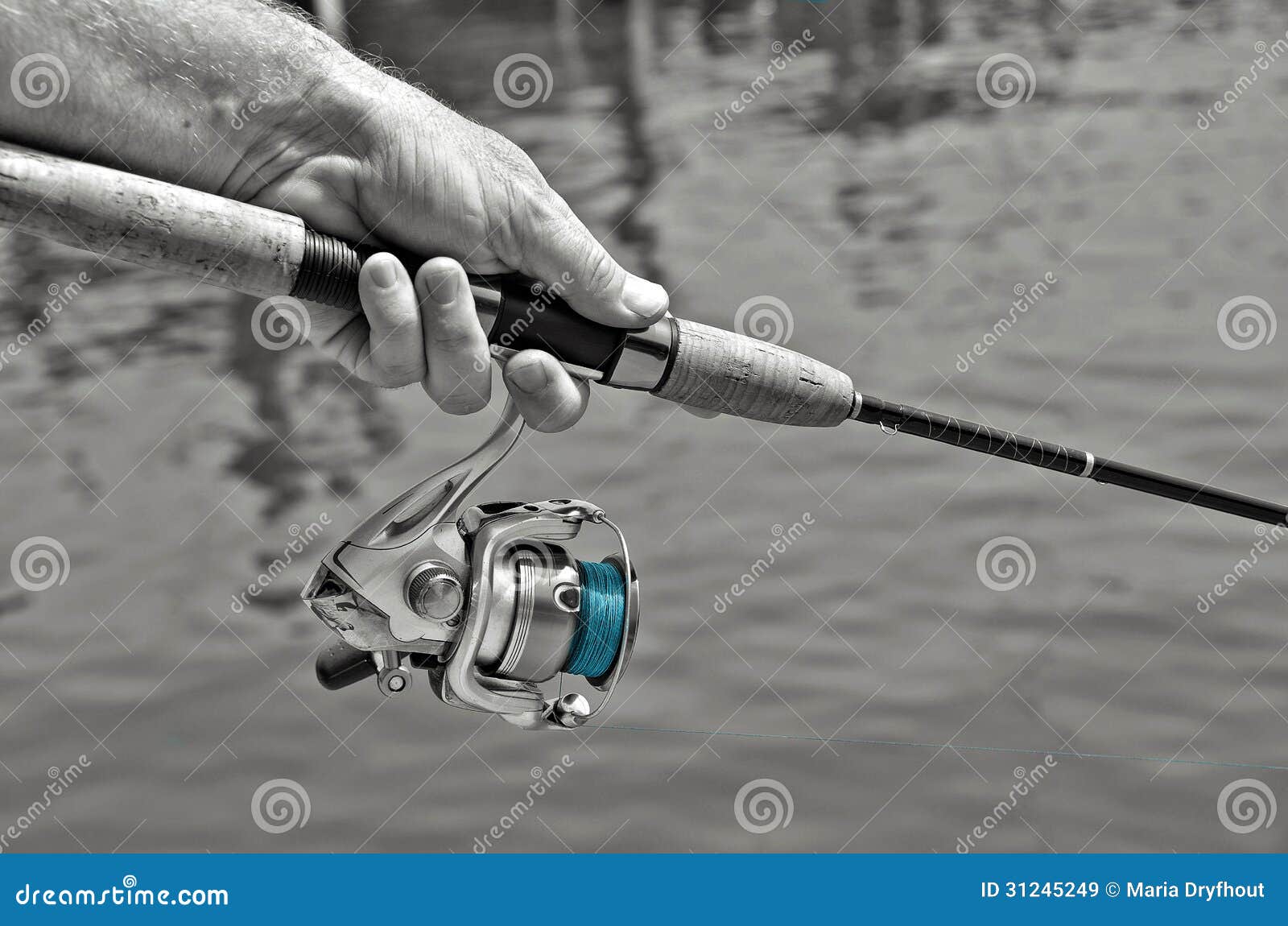 Mens die een hengel houden stock afbeelding. Image of visserij - 31245249