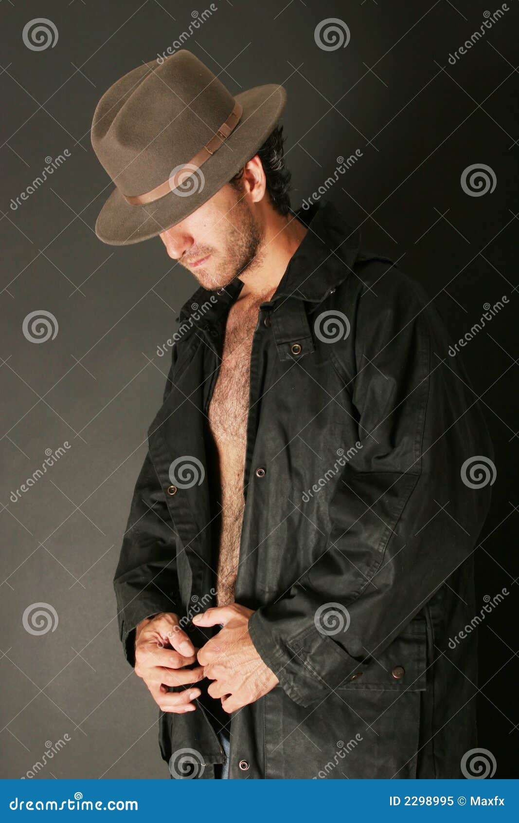 Mens Met Hoed En Trenchcoat Stock Afbeelding - Image of gezicht ...