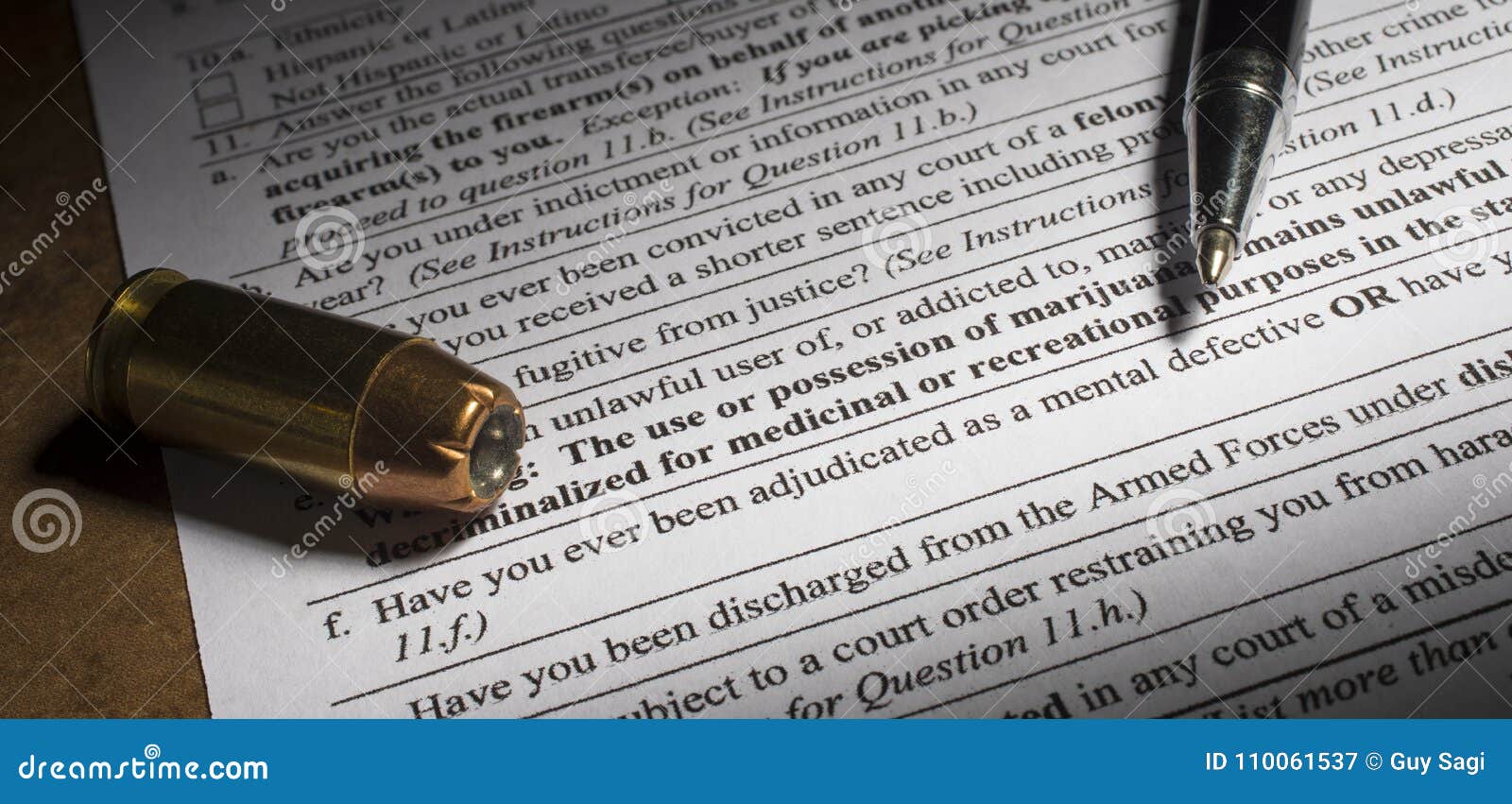 Fbi Nics Check Form That Is Public Domain With A Brown Polymer Handgun