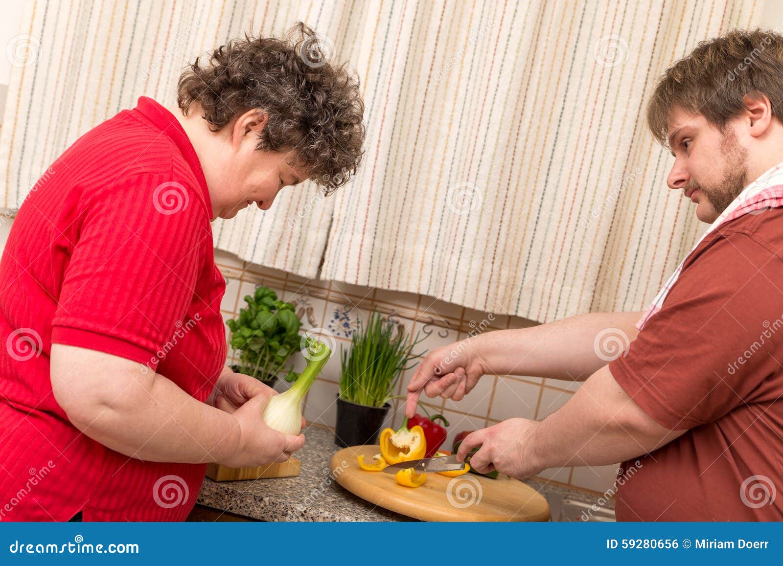 Mentally Disabled Woman Learns Cooking in the Kitchen Stock Photo ...