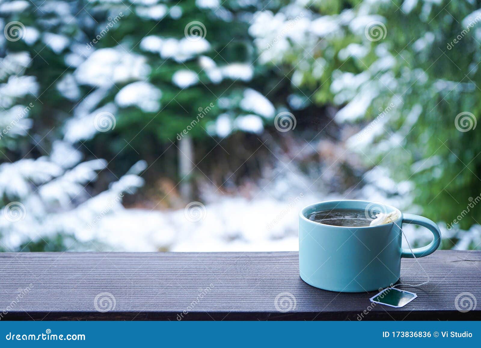 Menthol Tea Cup on Wooden Railing and Forest Background, Space for Text ...