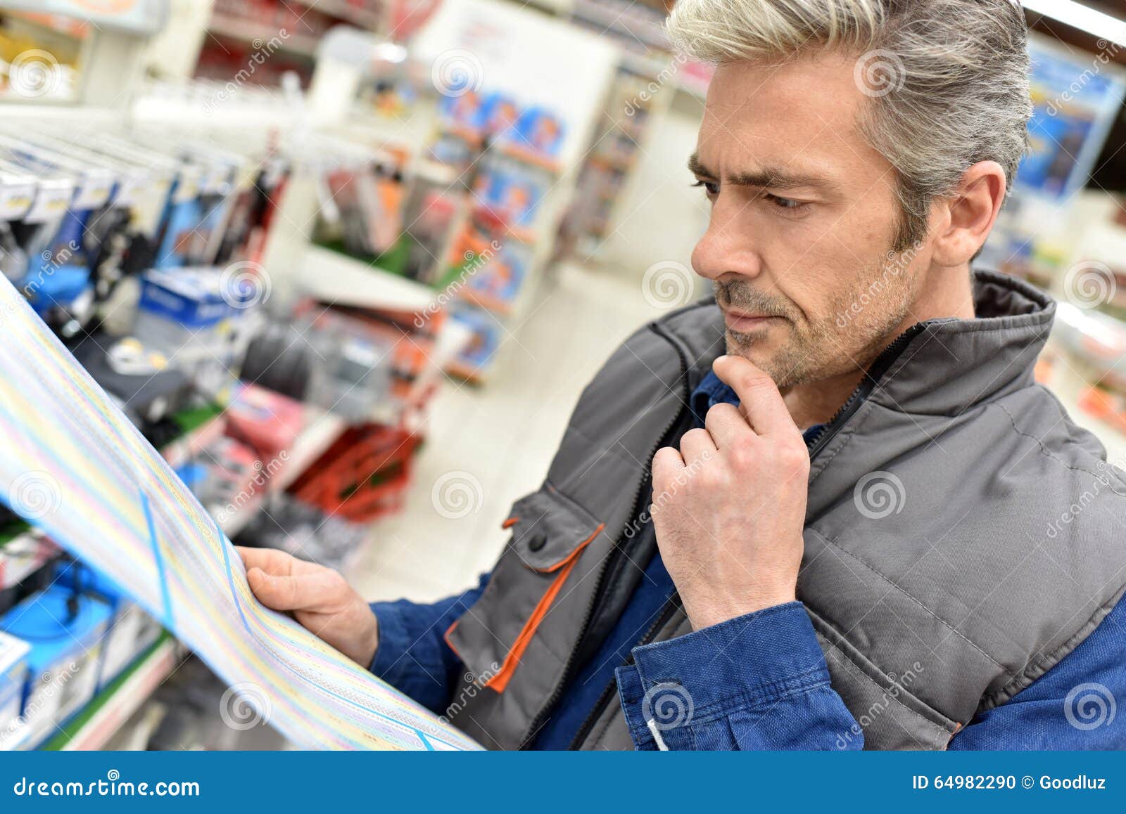 Merchandiser Making Inventory at Car Store Stock Photo - Image of ...