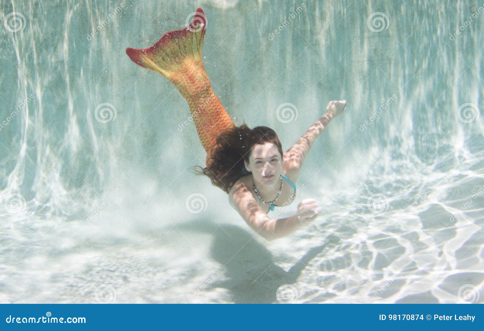A Mermaid with and Orange Tail Underwater. Stock Photo - Image of ...