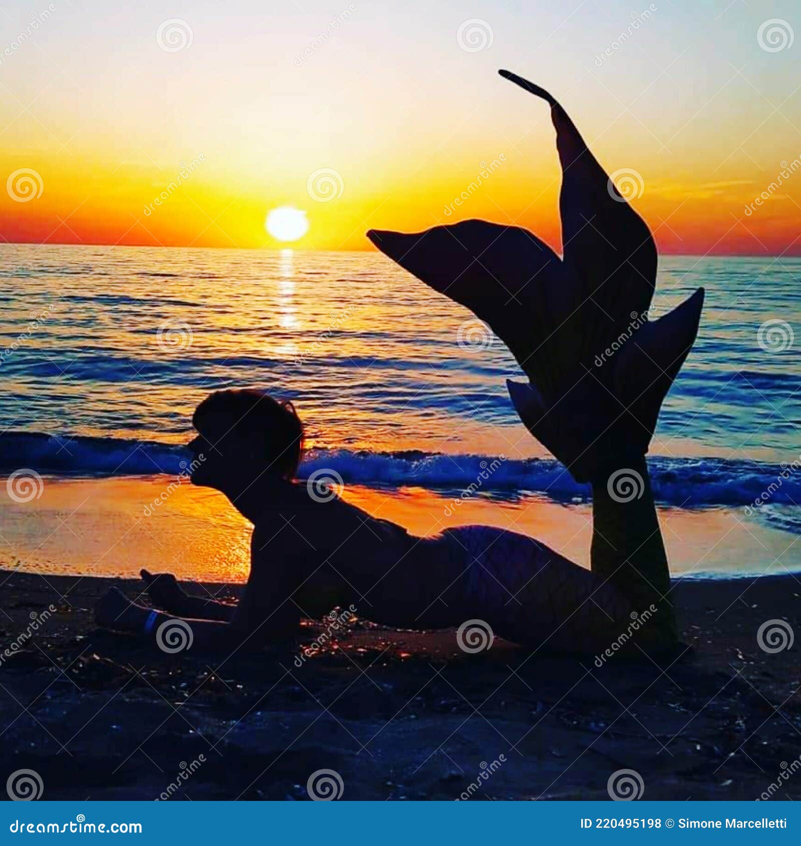 Mermaid at sunset stock photo. Image of colors, woman - 220495198