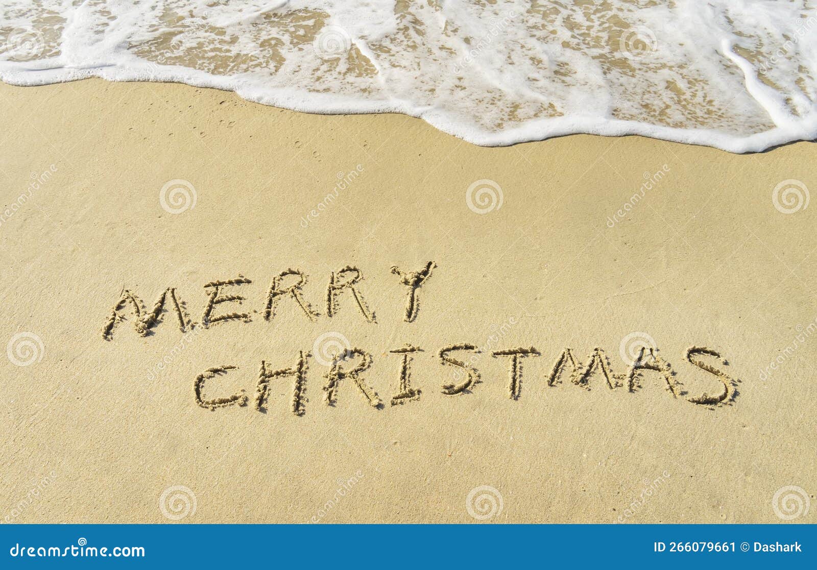 Merry Christmas Handwritten in Sand on Beach Stock Image - Image of ...