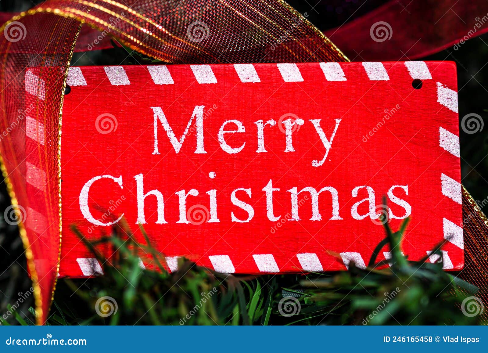 Merry Christmas Sign Hanging in the Christmas Tree Stock Photo - Image ...