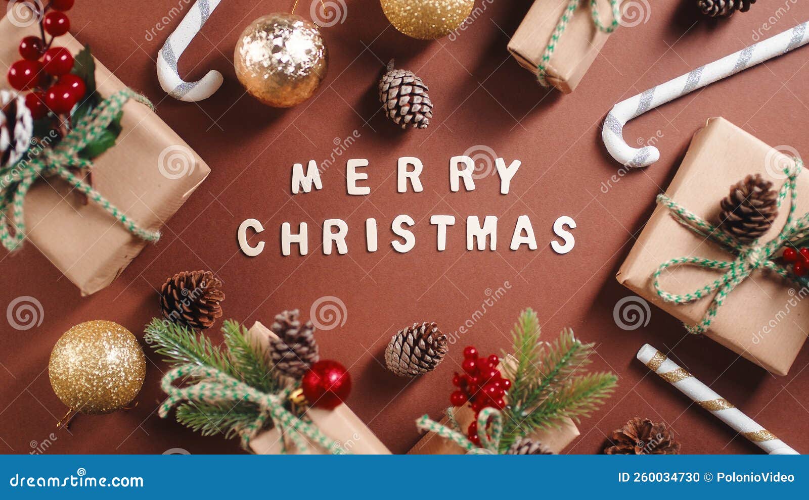 Merry Christmas Text on Brown Table with Gift Boxes Stock Photo - Image ...