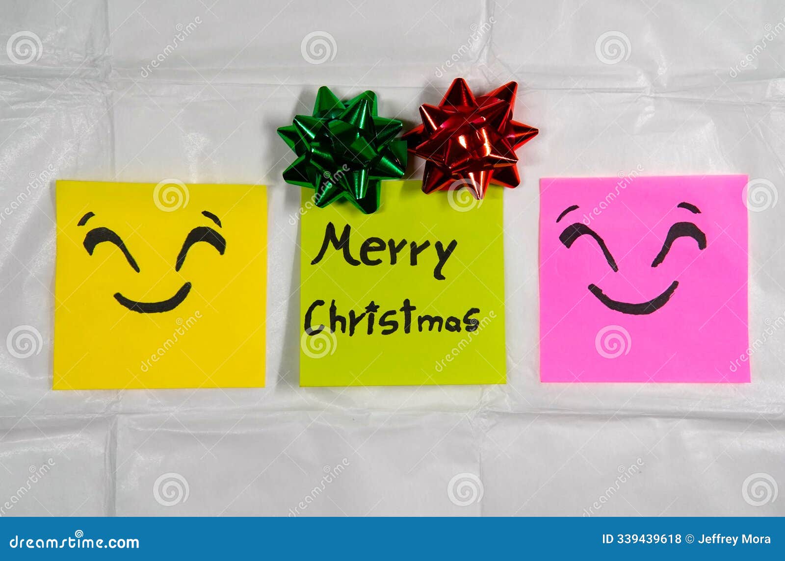 Merry Christmas! Write on Sticky Notes with Happy Face Stock ...